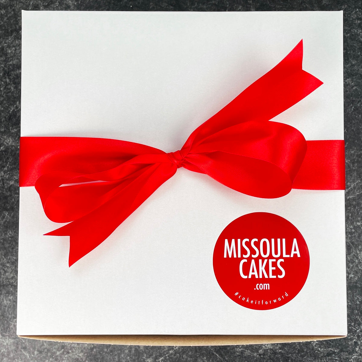 Decorative Ribbon Around Box – Missoula Cakes